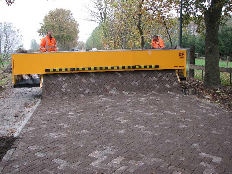 This Machine Prints Brick Roads » TwistedSifter