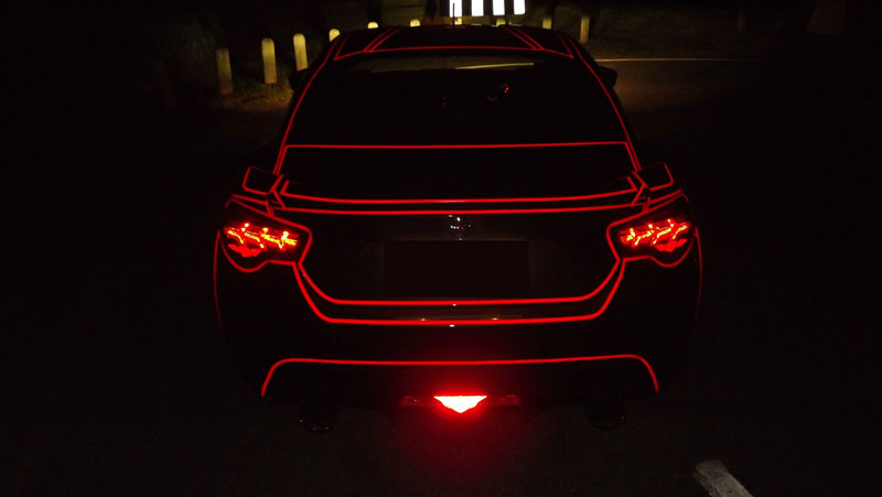 Guy Makes Tron Car Using Reflective Vinyl Tape - TwistedSifter