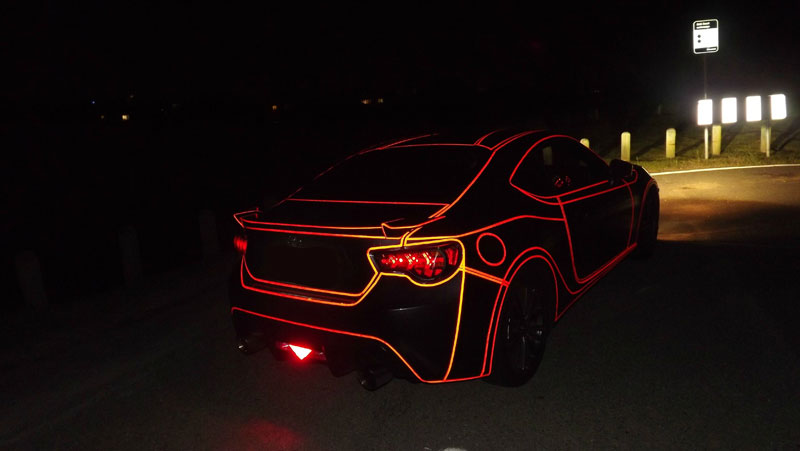 Guy Makes Tron Car Using Reflective Vinyl Tape » TwistedSifter