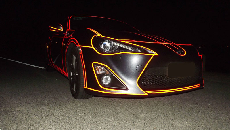 Guy Makes Tron Car Using Reflective Vinyl Tape - TwistedSifter