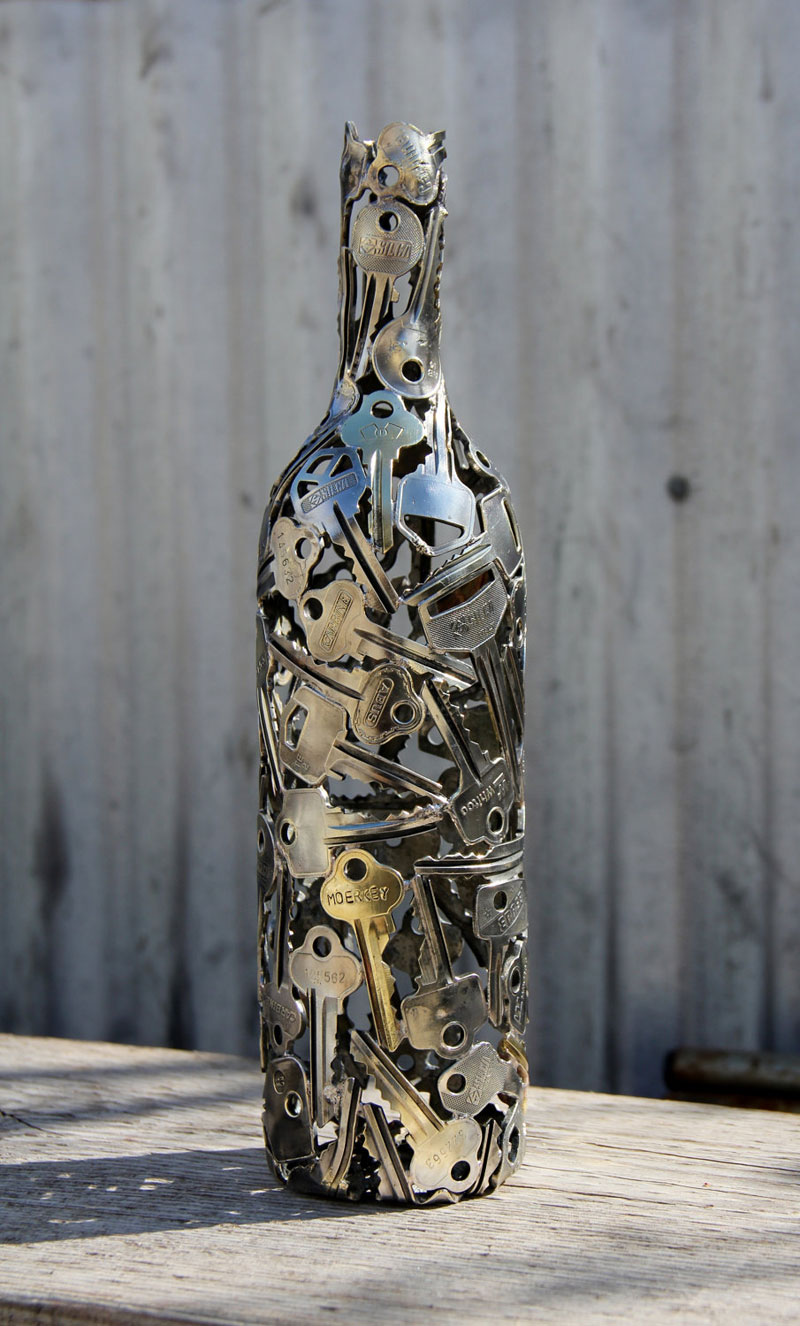 Artist Turns Discarded Keys and Coins Into Works of Art - TwistedSifter