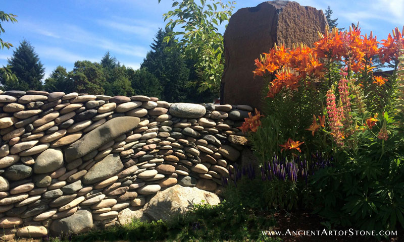 Couple Creates the Most Beautiful Stone Walls Ever - TwistedSifter