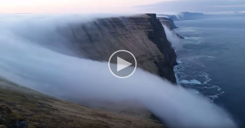 Fog Rolls Over Cliff Like a Waterfall » TwistedSifter