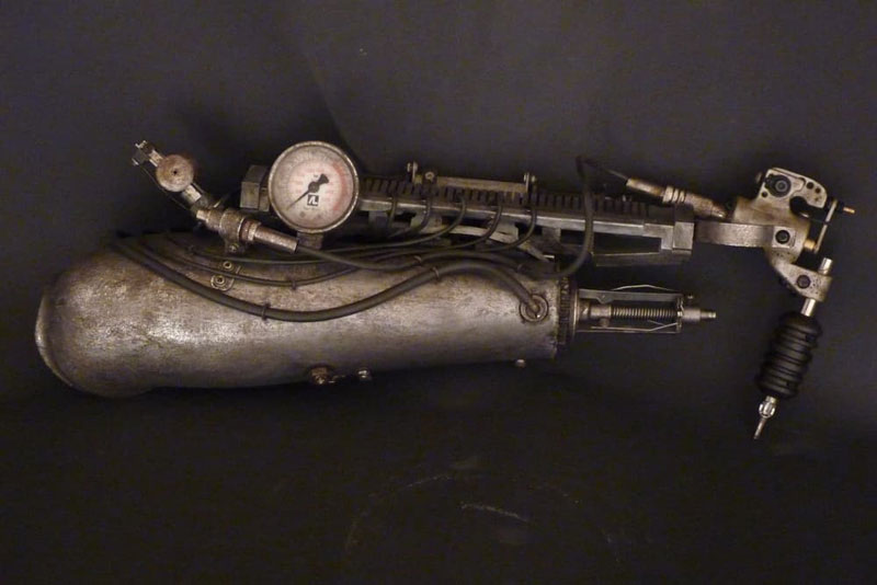 Artist Turns Prosthetic Arm Into Badass Tattoo Machine » TwistedSifter