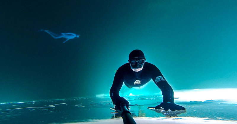 This Upside Down, Frozen Lake Free Dive Will Mess With Your Senses ...
