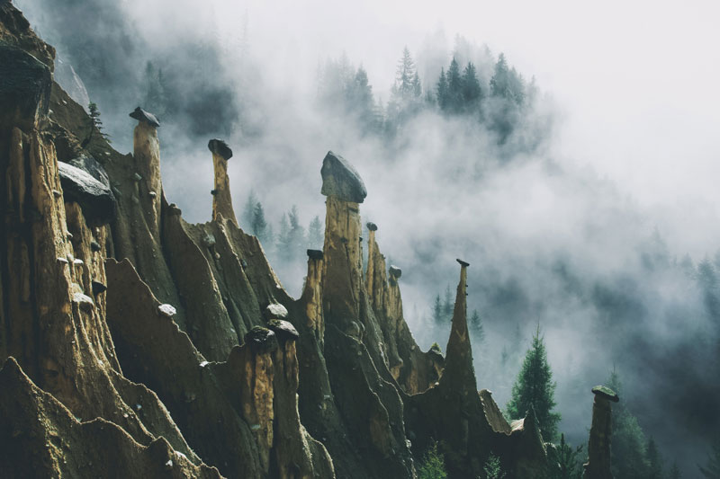 The Earth Pyramids of Italy: Where Boulders Perch Atop Pillars of Clay ...