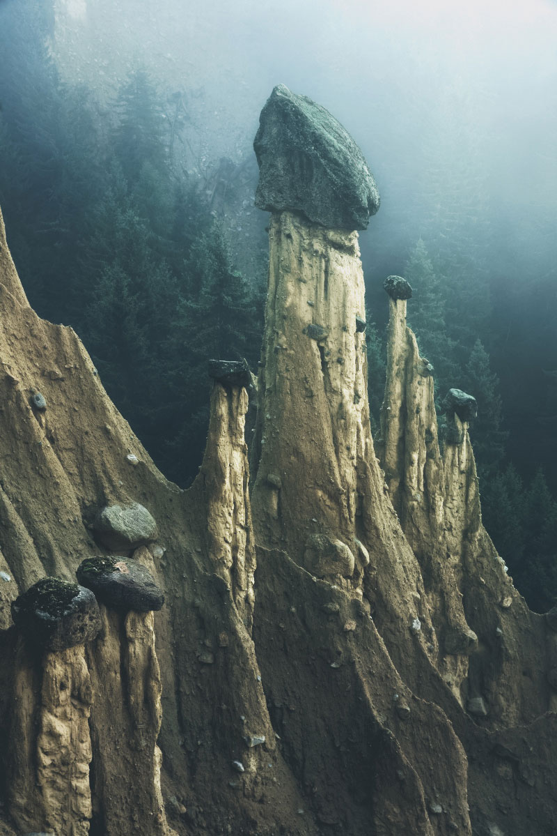 The Earth Pyramids of Italy: Where Boulders Perch Atop Pillars of Clay ...