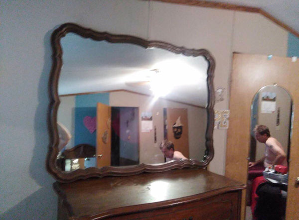 21 Pictures of People Trying to Take Photos of Mirrors They’re Selling ...