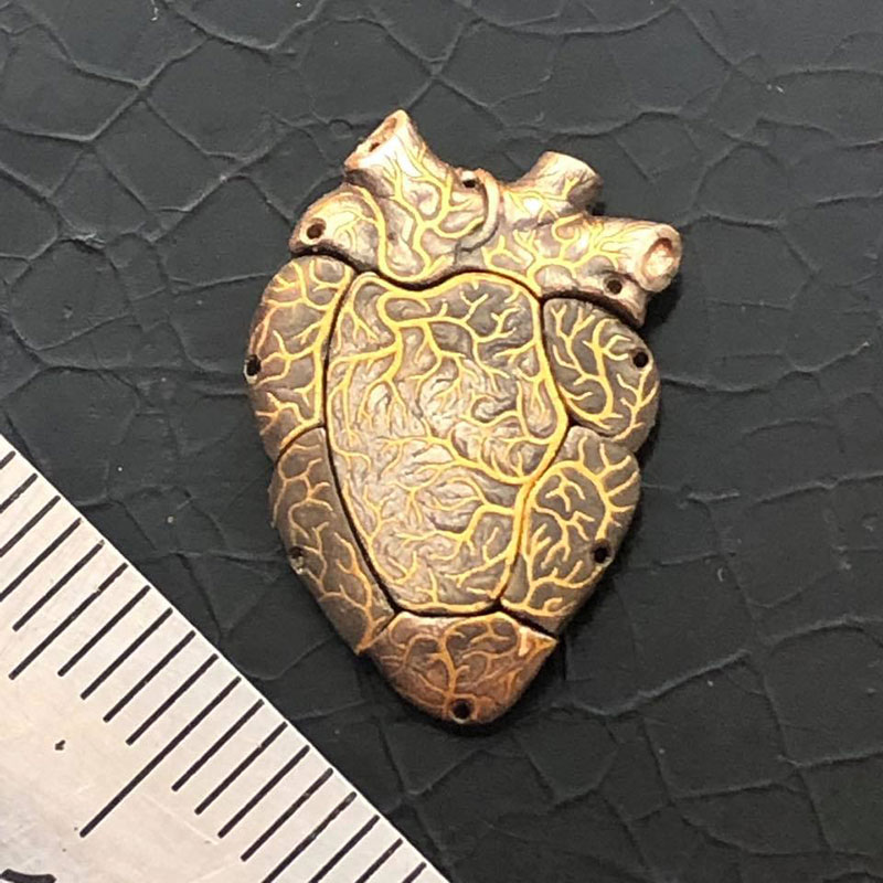 This Beating Heart Coin Carved by Roman Booteen is Absolutely Wild ...