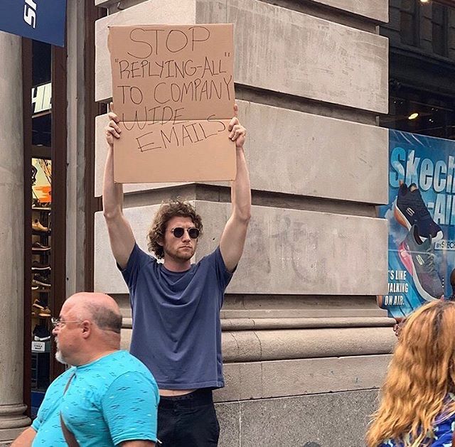 Dude with Sign Protests the Most Random Things (13 Photos) » TwistedSifter